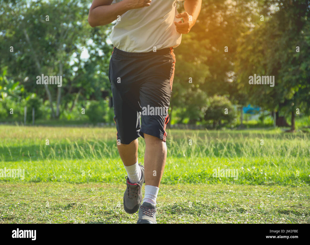 Handsome man running hi-res stock photography and images - Alamy