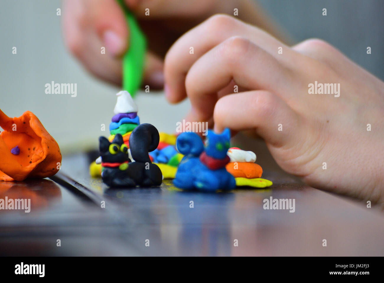 Coloured children hands hi-res stock photography and images - Alamy