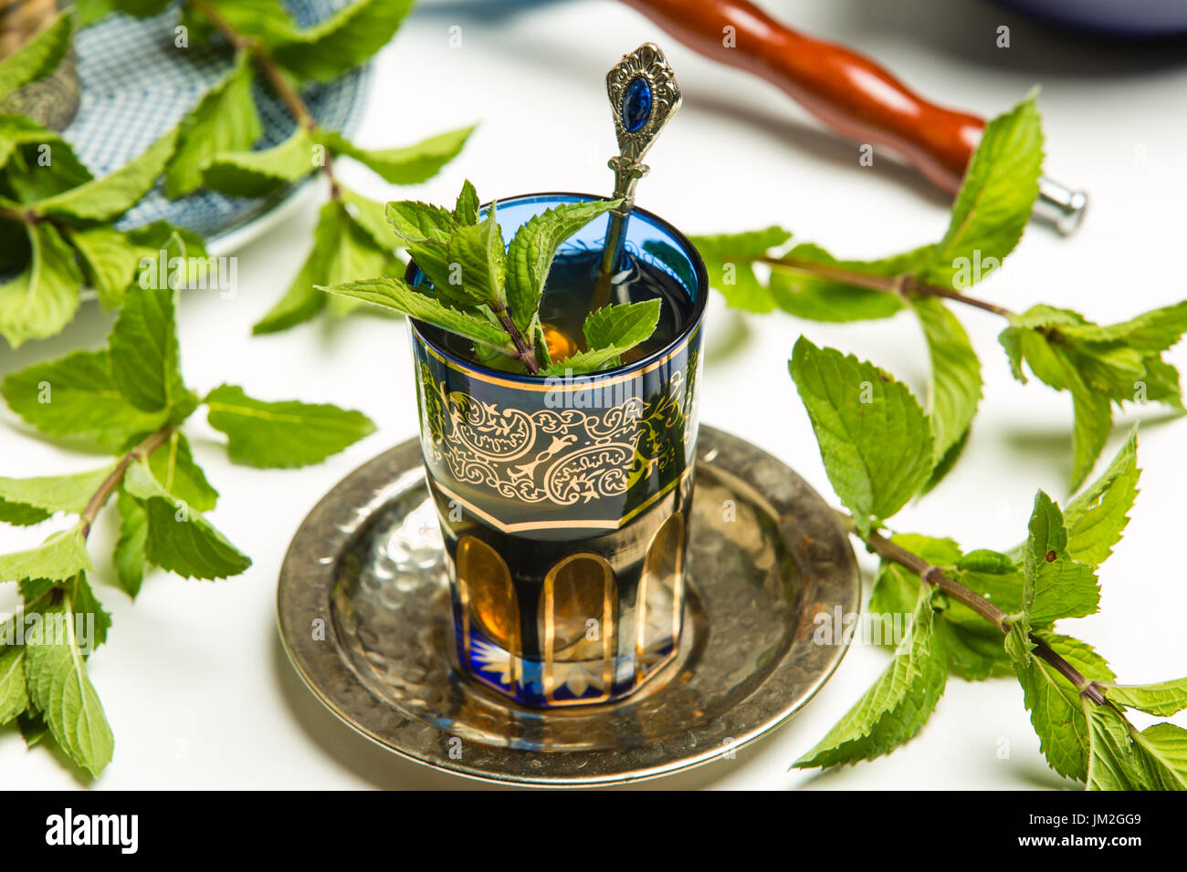 Traditional Arab mint tea in a traditional cup with mint leaves Stock ...