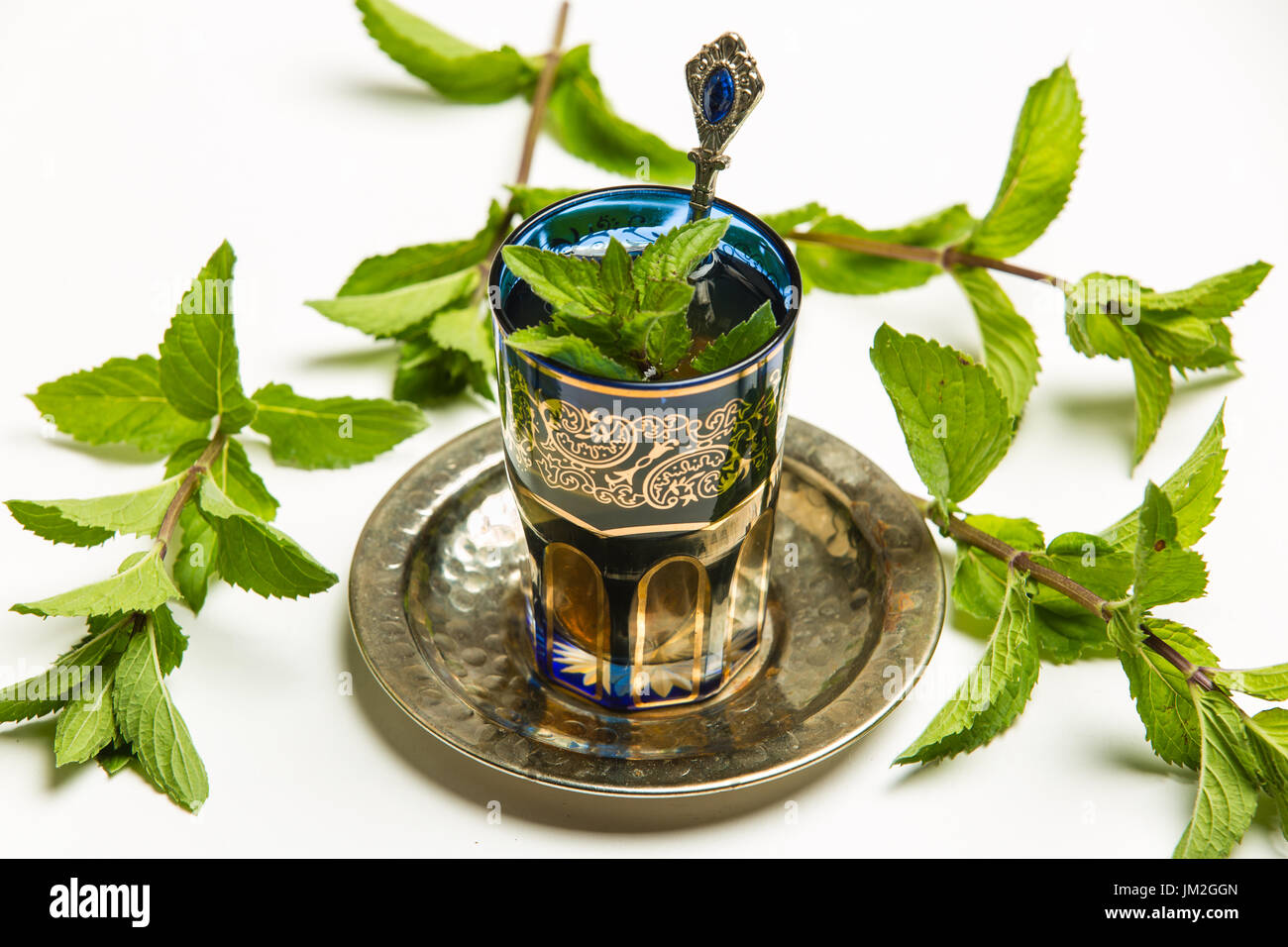 Traditional Arab mint tea in a traditional cup with mint leaves Stock ...