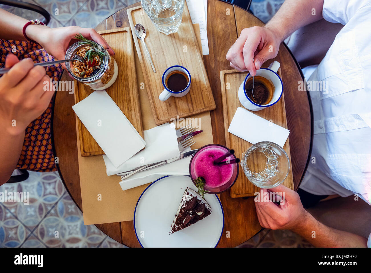 Couple having coffee in cafe hi-res stock photography and images - Alamy