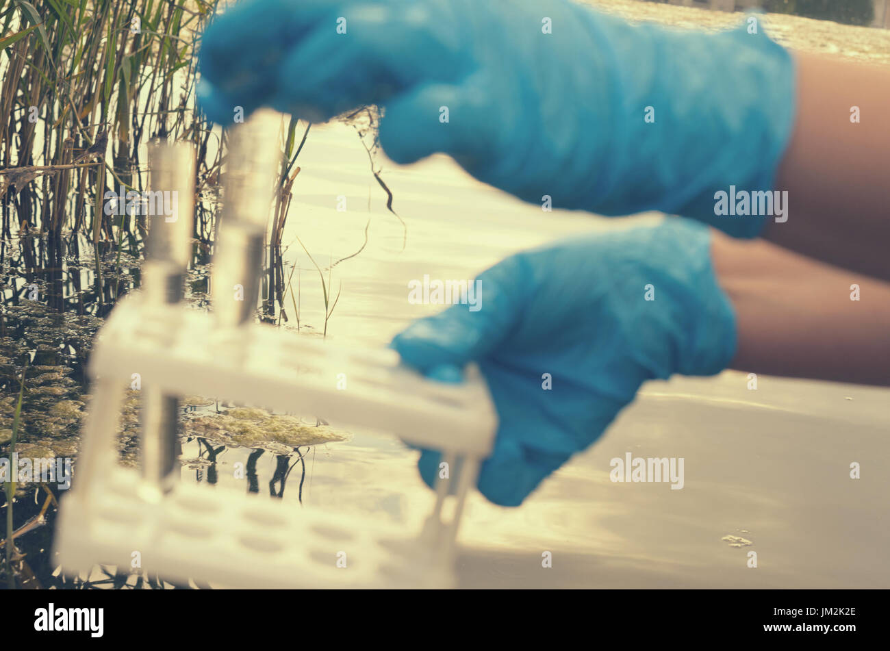 Taking a water test for analysis from a reservoir Stock Photo - Alamy