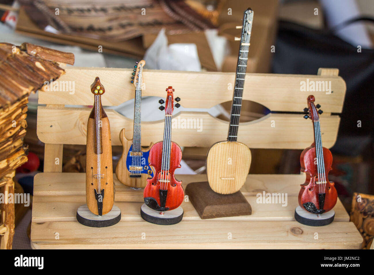 Set of models of musical instruments made of wood Stock Photo - Alamy