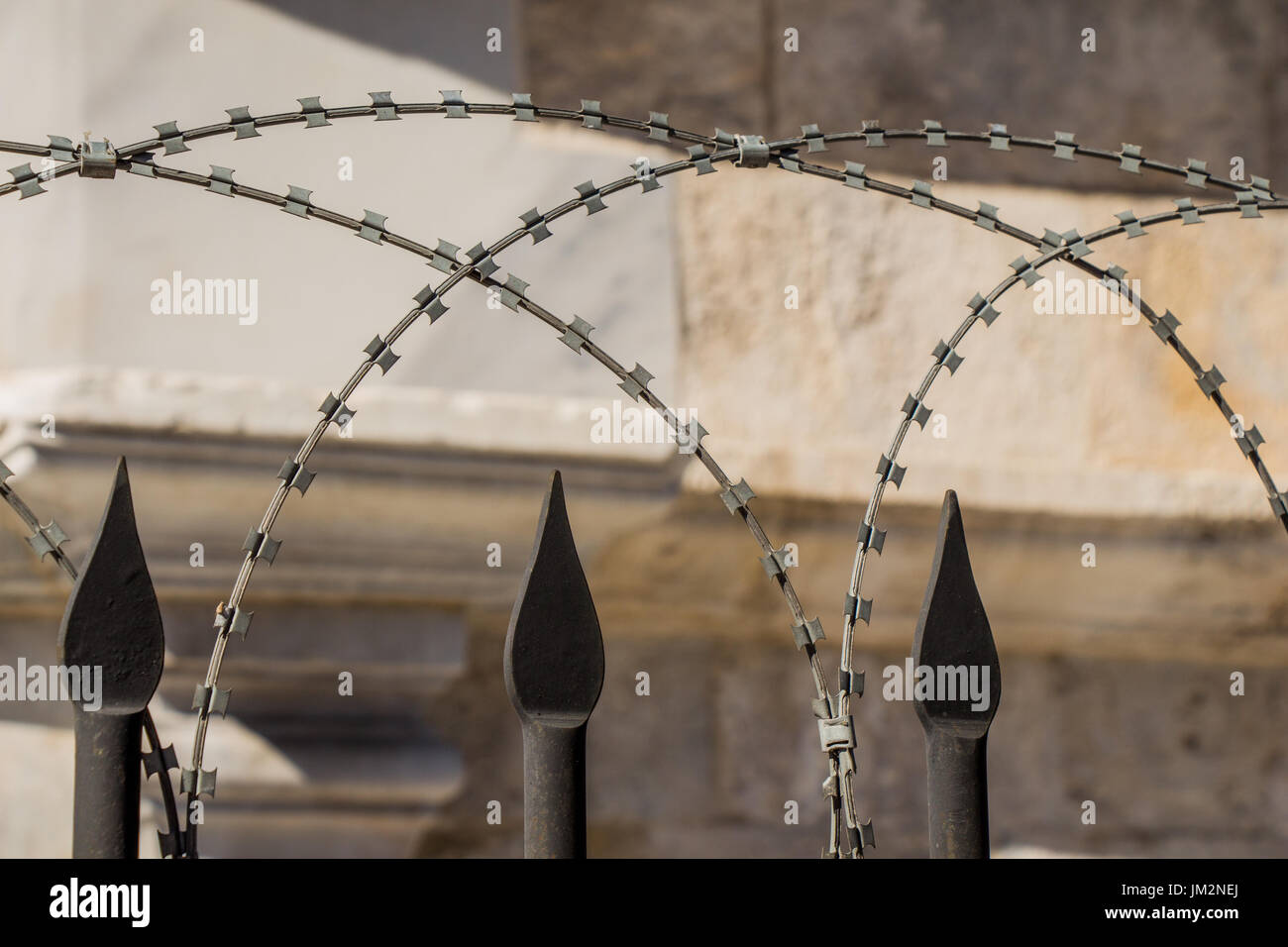 barbed wire fence used for protection purposes Stock Photo - Alamy