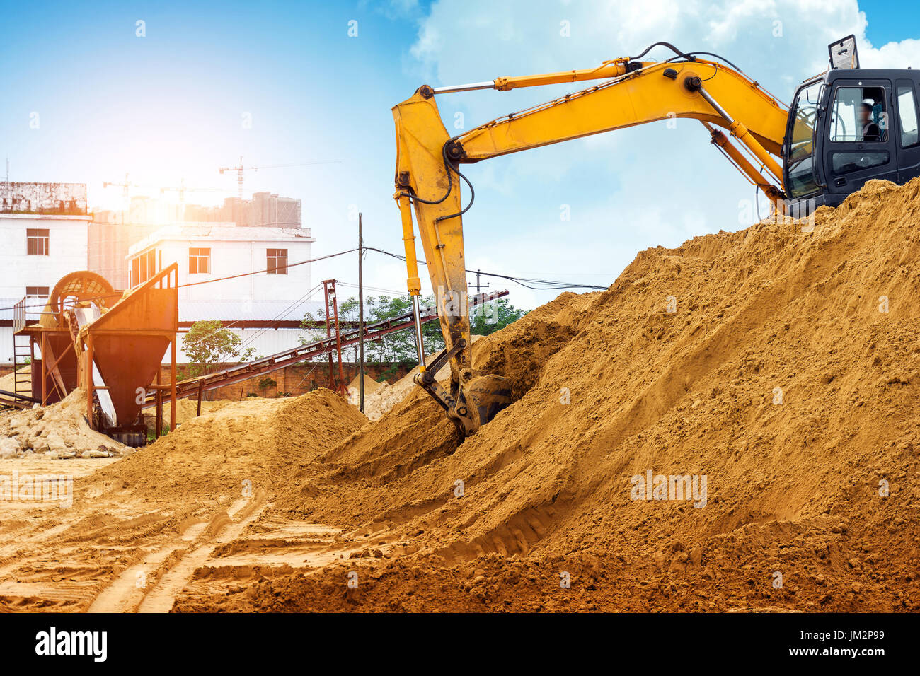 Construction sites, excavators and large amounts of dirt are being ...