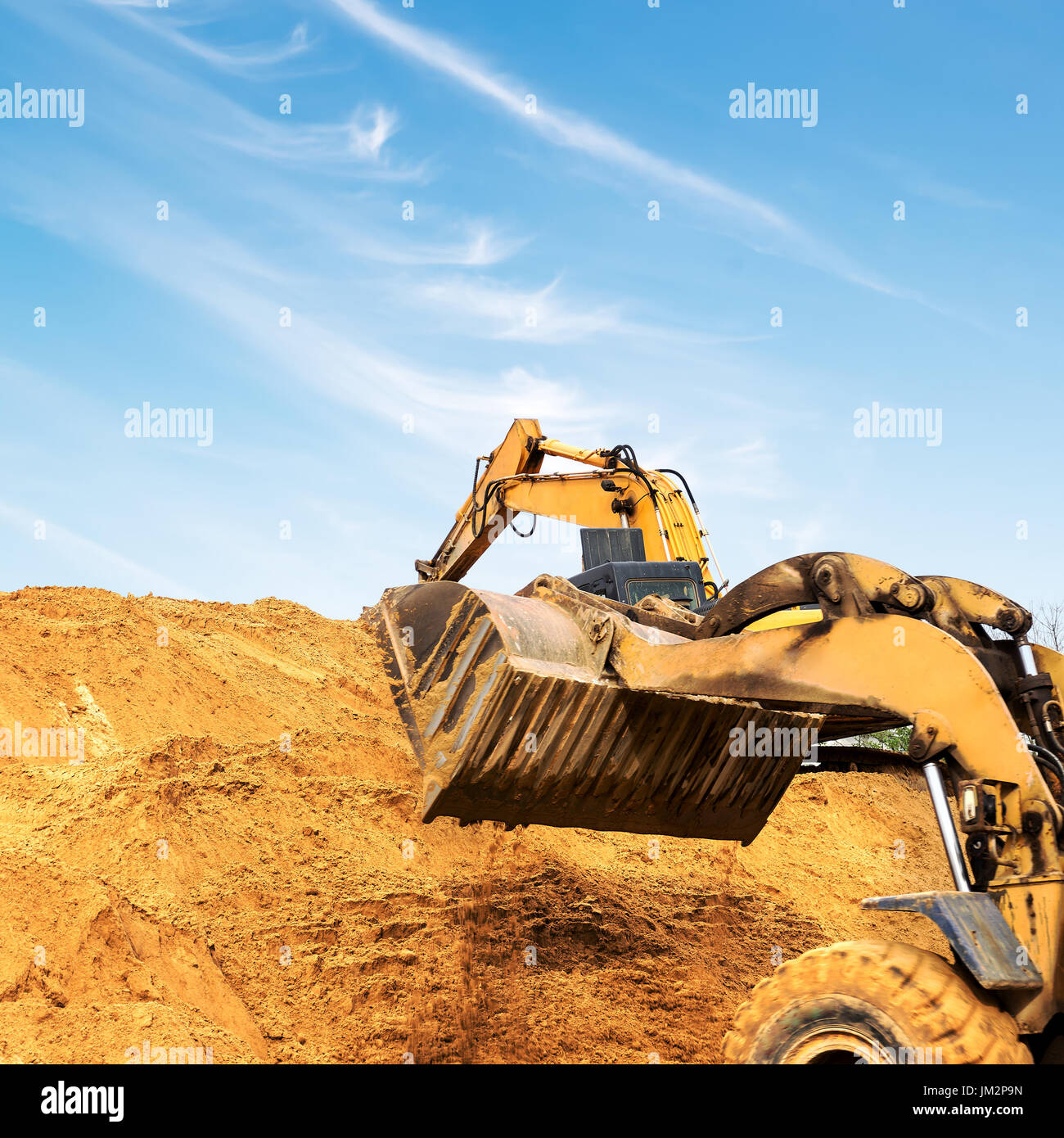Construction sites, excavators and large amounts of dirt are being ...