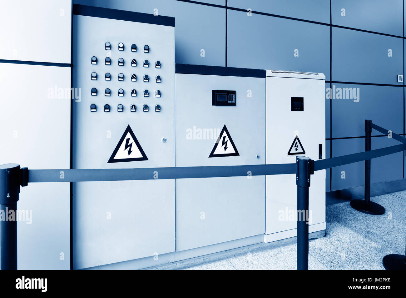 Electrical equipment and warning signs on the corridor Stock Photo - Alamy