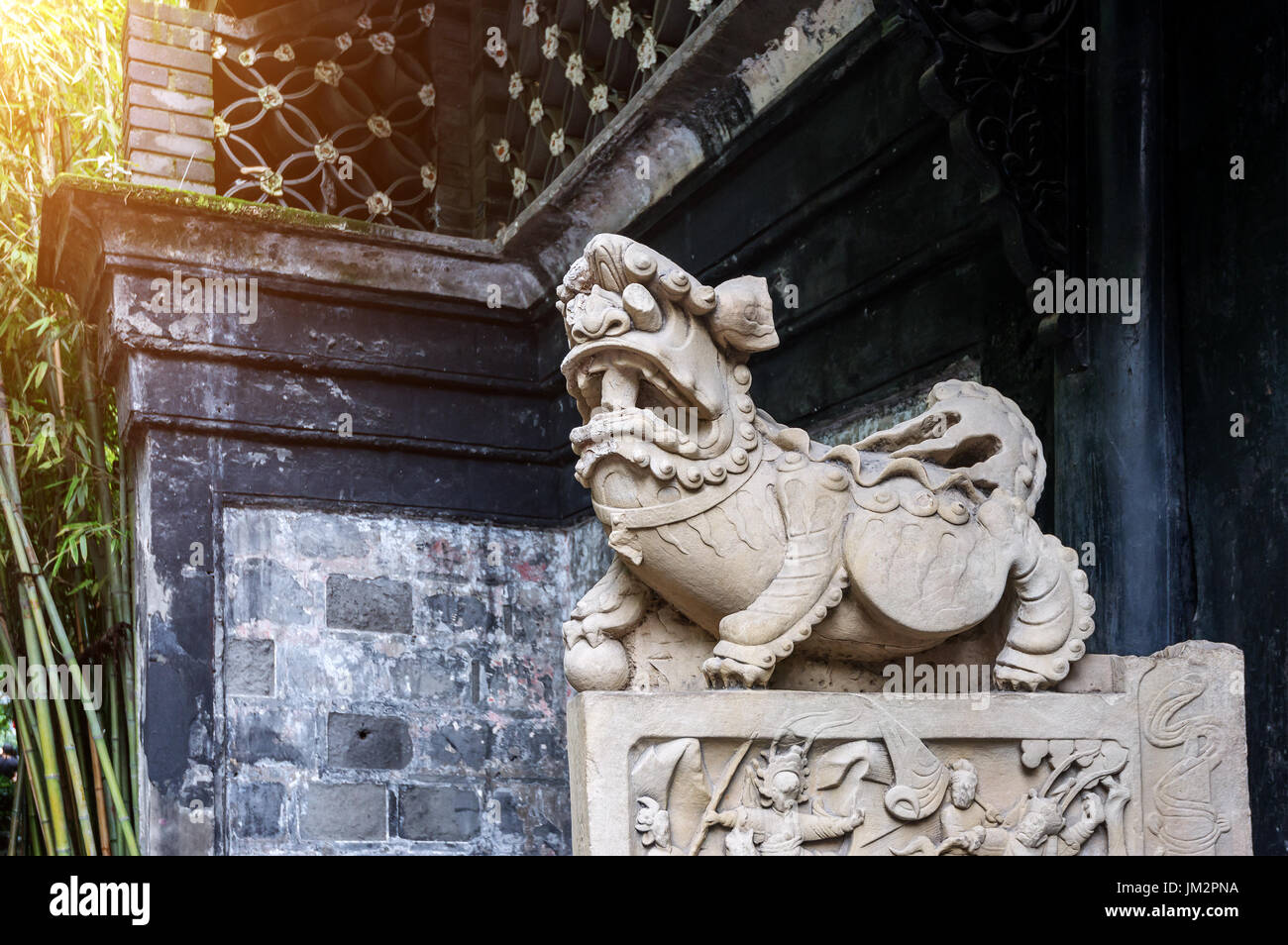 Chinese rock statue in an oriental garden in Chengdu, China Stock Photo ...