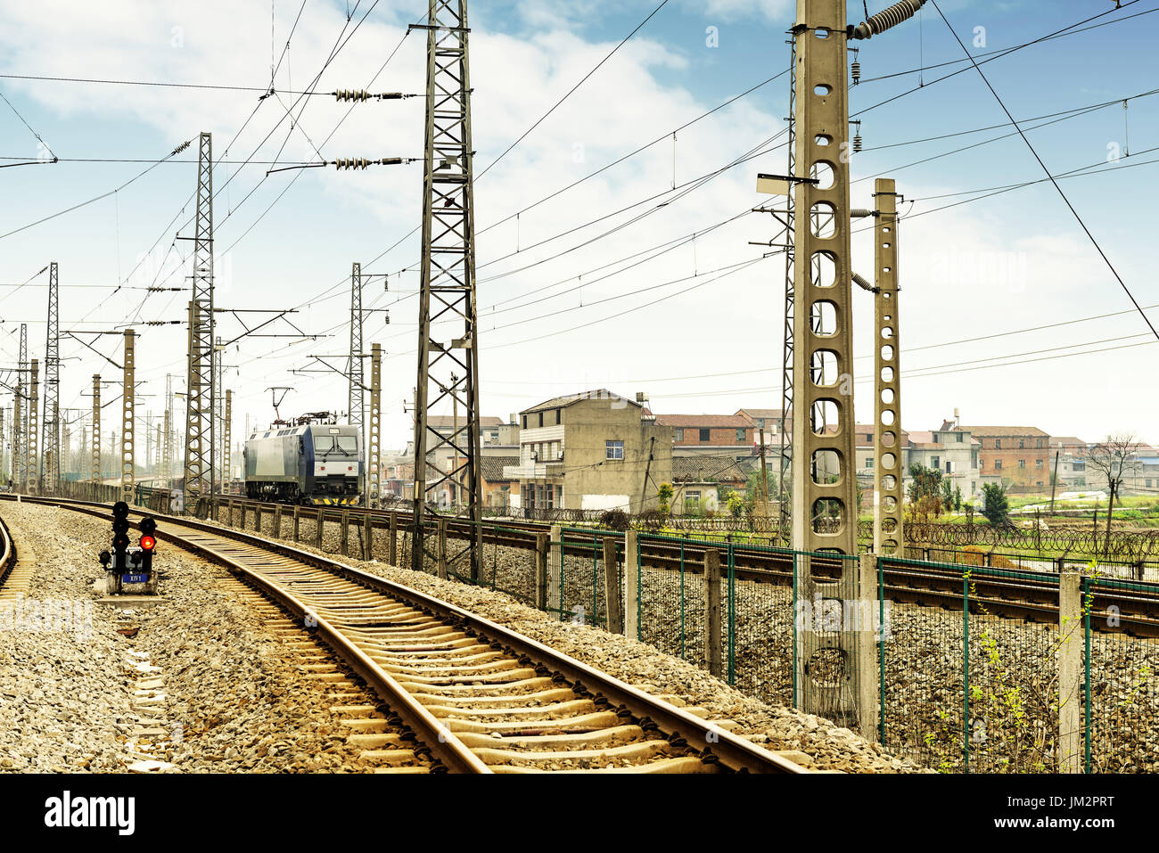 Railway transport hub and the train in motion Stock Photo - Alamy