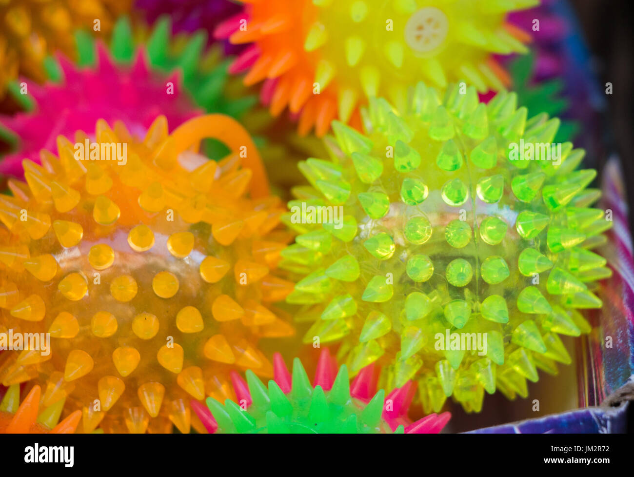 Rubber ball of various color as a background Stock Photo - Alamy