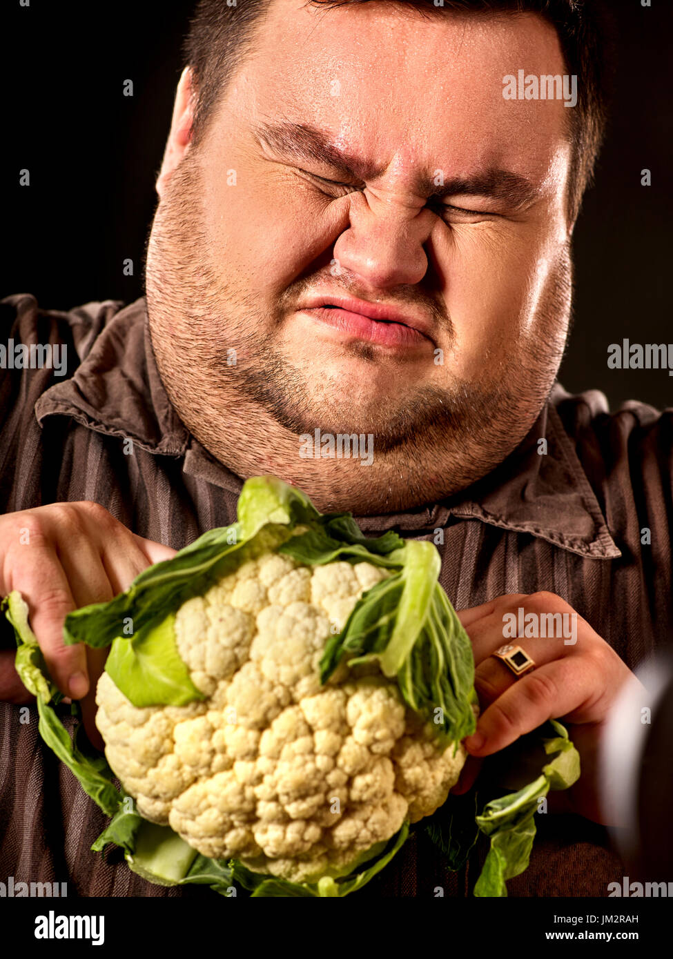 Diet fat man eating healthy food. Healthy breakfast vegetables ...
