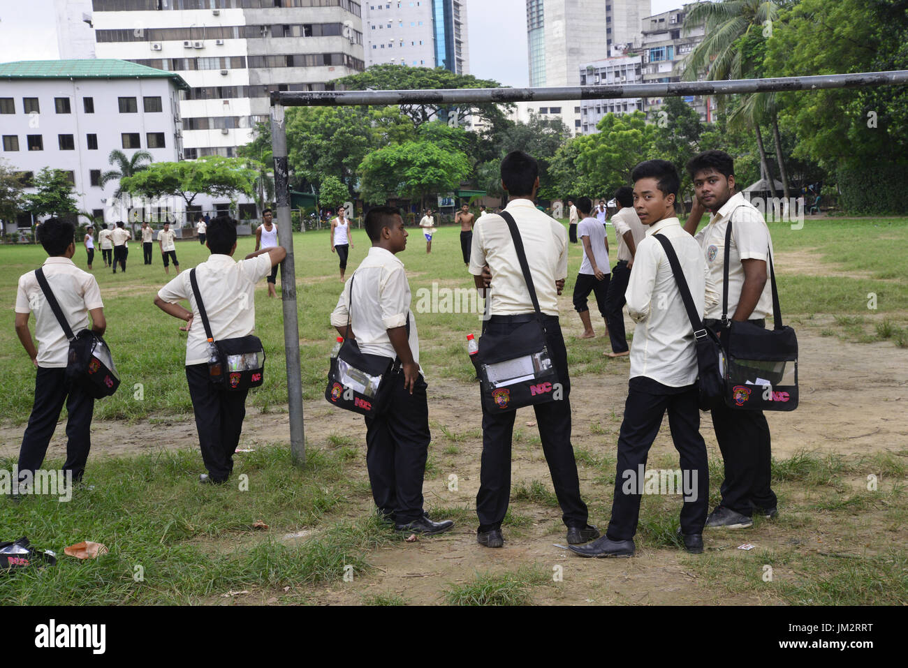 Bangladeshi collage students playing football on the collage ground at ...