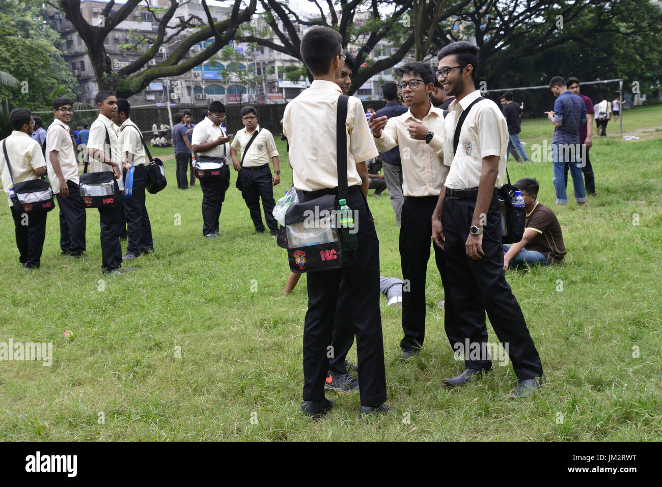 Bangladeshi collage students walking on the collage ground at class ...
