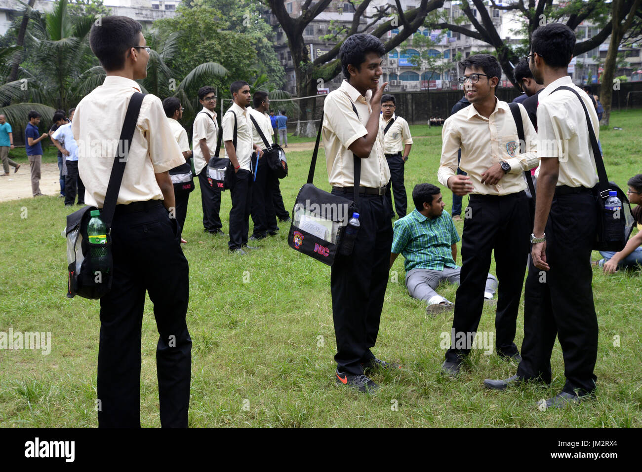 Bangladeshi collage students walking on the collage ground at class ...