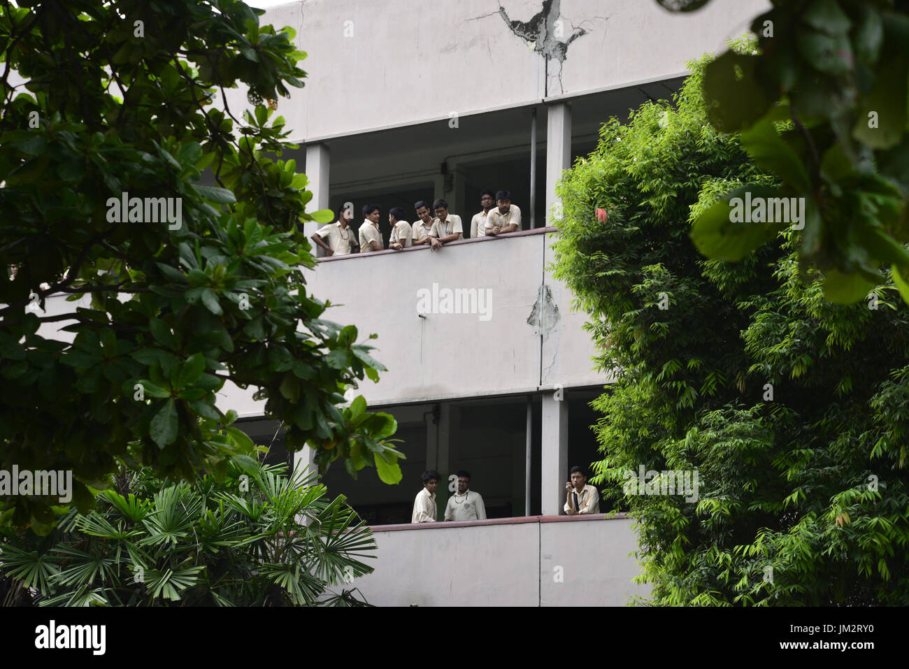 Bangladeshi collage students walking on the collage ground at class ...
