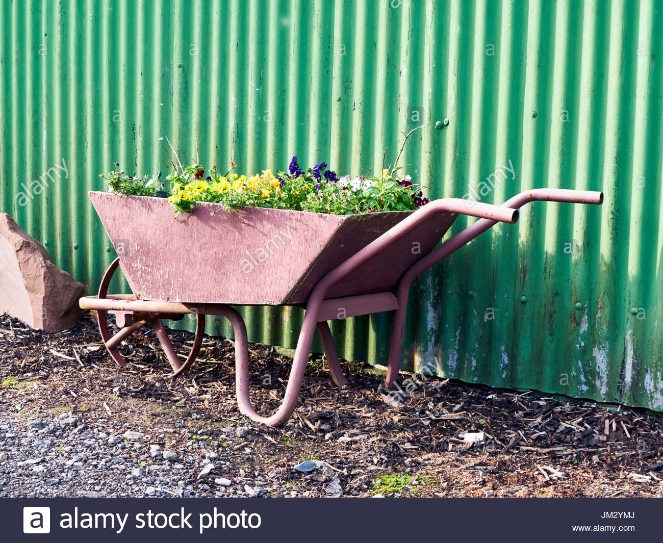 Old Metal Wheelbarrow High Resolution Stock Photography and Images - Alamy