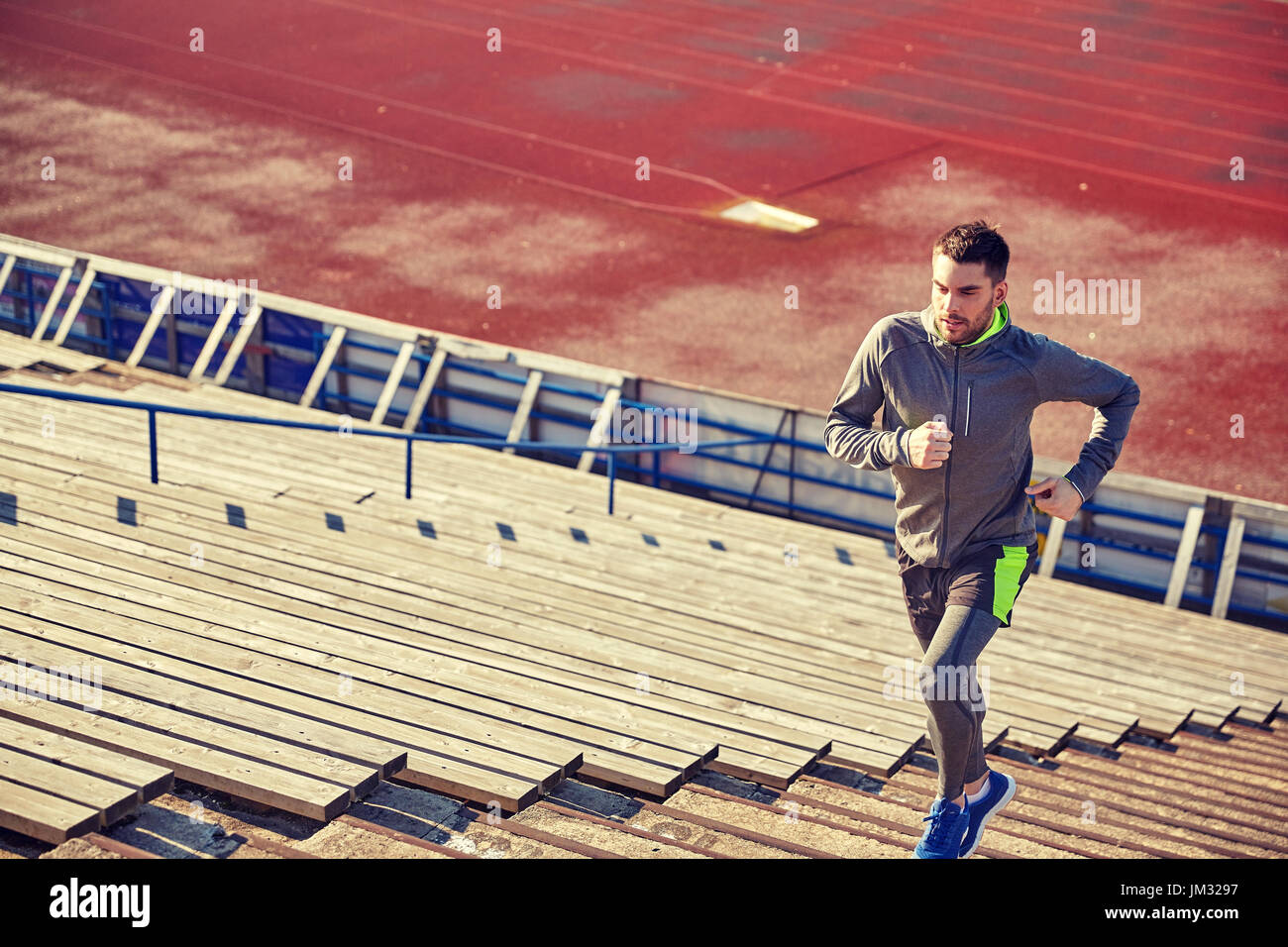 Man running up stairs hi-res stock photography and images - Alamy