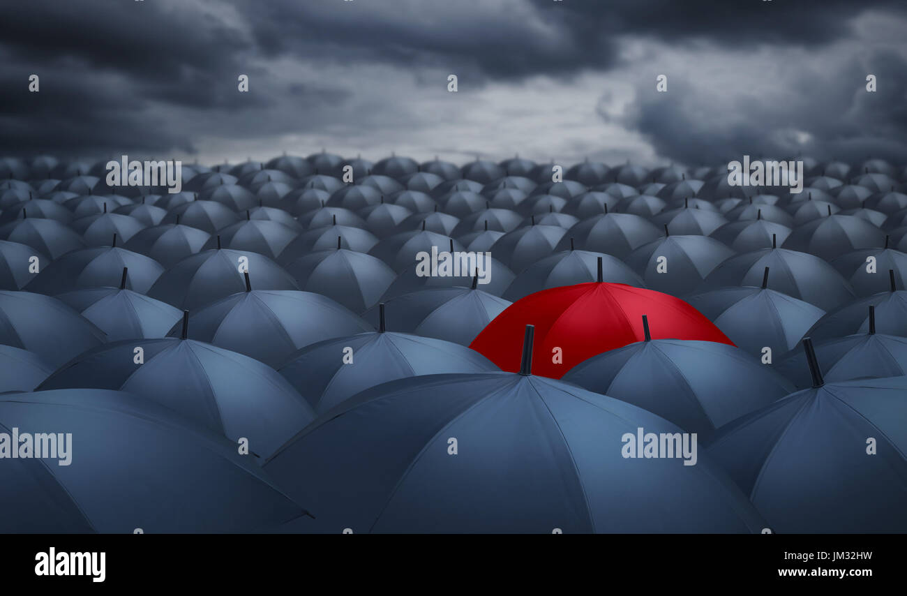 Being different concept with red umbrella outstanding from the others ...