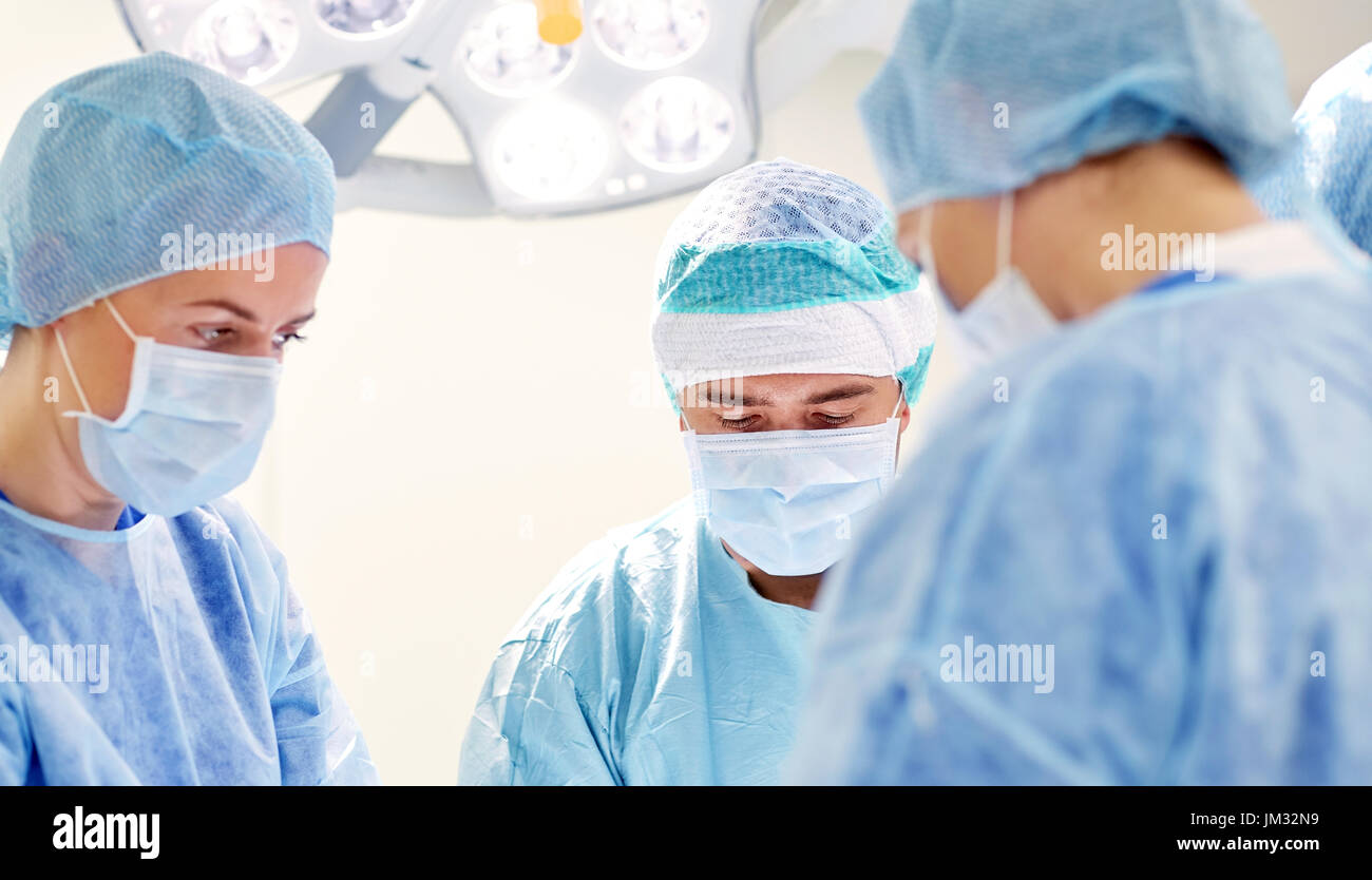 group of surgeons in operating room at hospital Stock Photo - Alamy