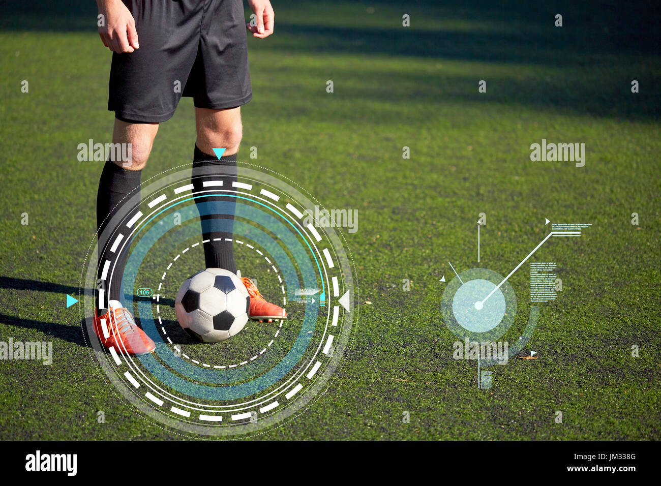 soccer player playing with ball on football field Stock Photo - Alamy