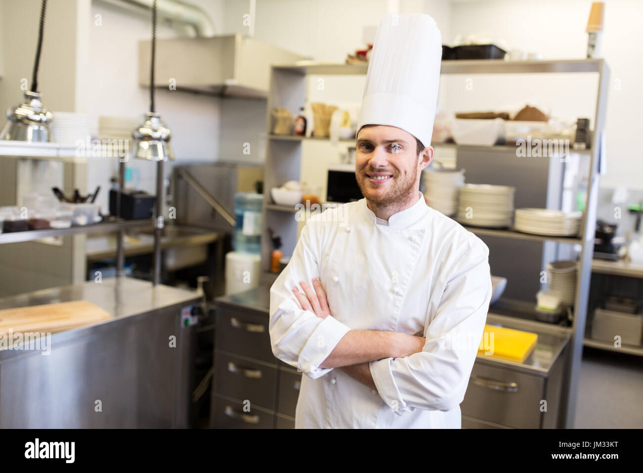happy male chef cook at restaurant kitchen Stock Photo - Alamy