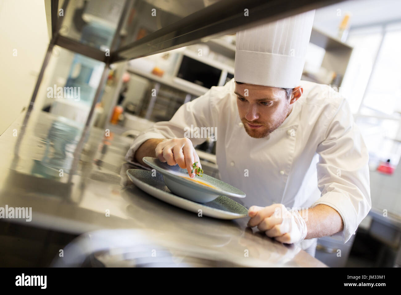 happy male chef cooking food at restaurant kitchen Stock Photo - Alamy