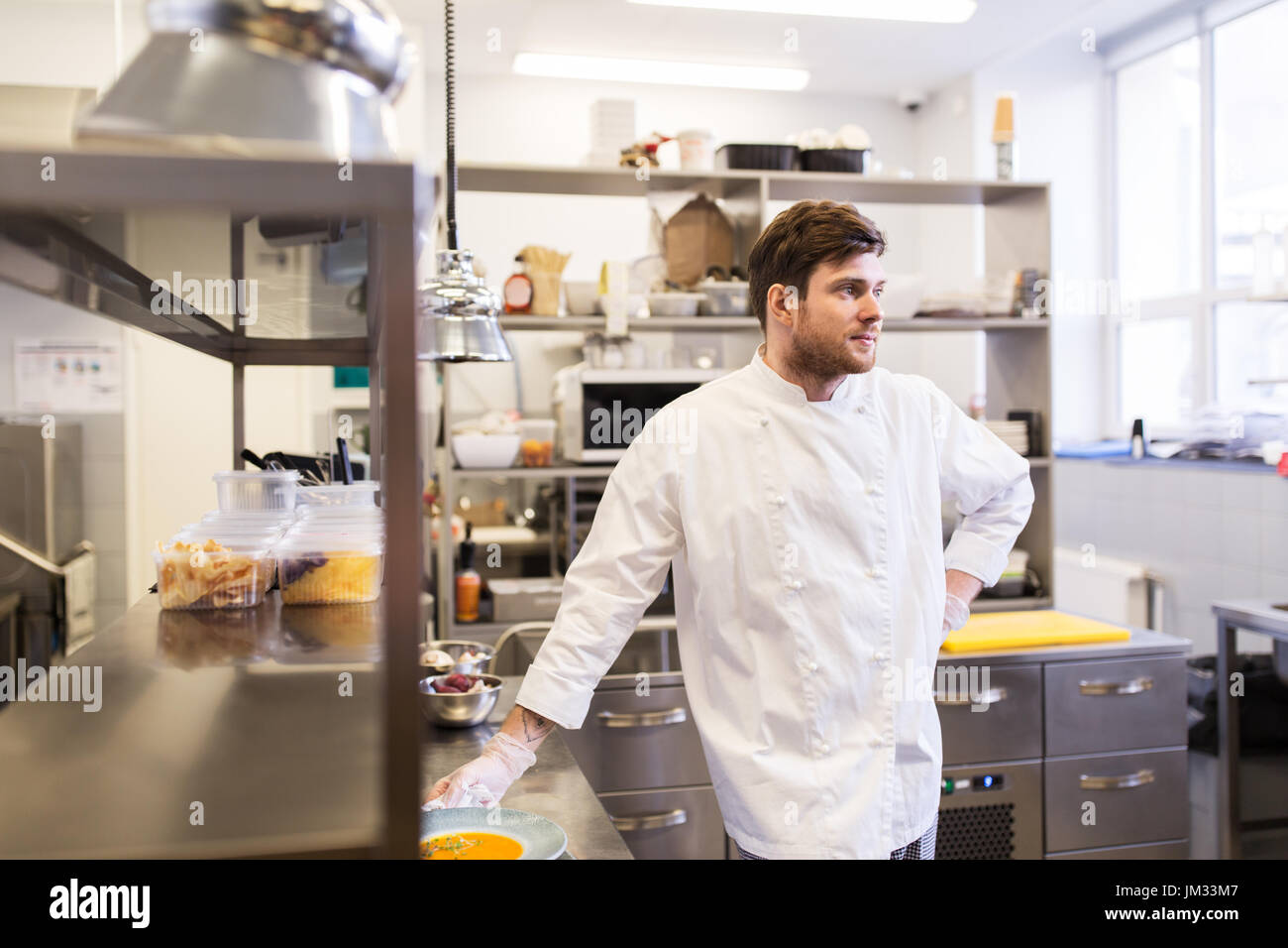 happy male chef cooking food at restaurant kitchen Stock Photo - Alamy