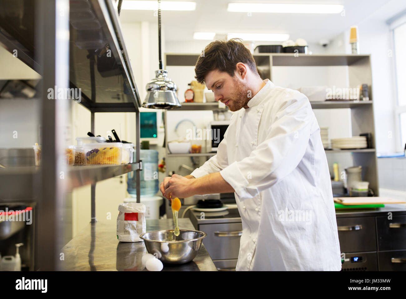 Kitchen man egg hi-res stock photography and images - Alamy