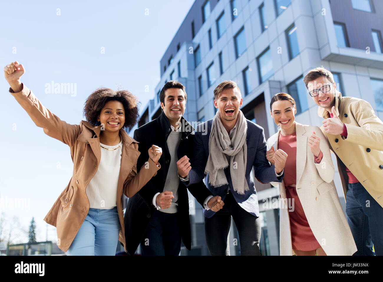 international group of people on city street Stock Photo - Alamy