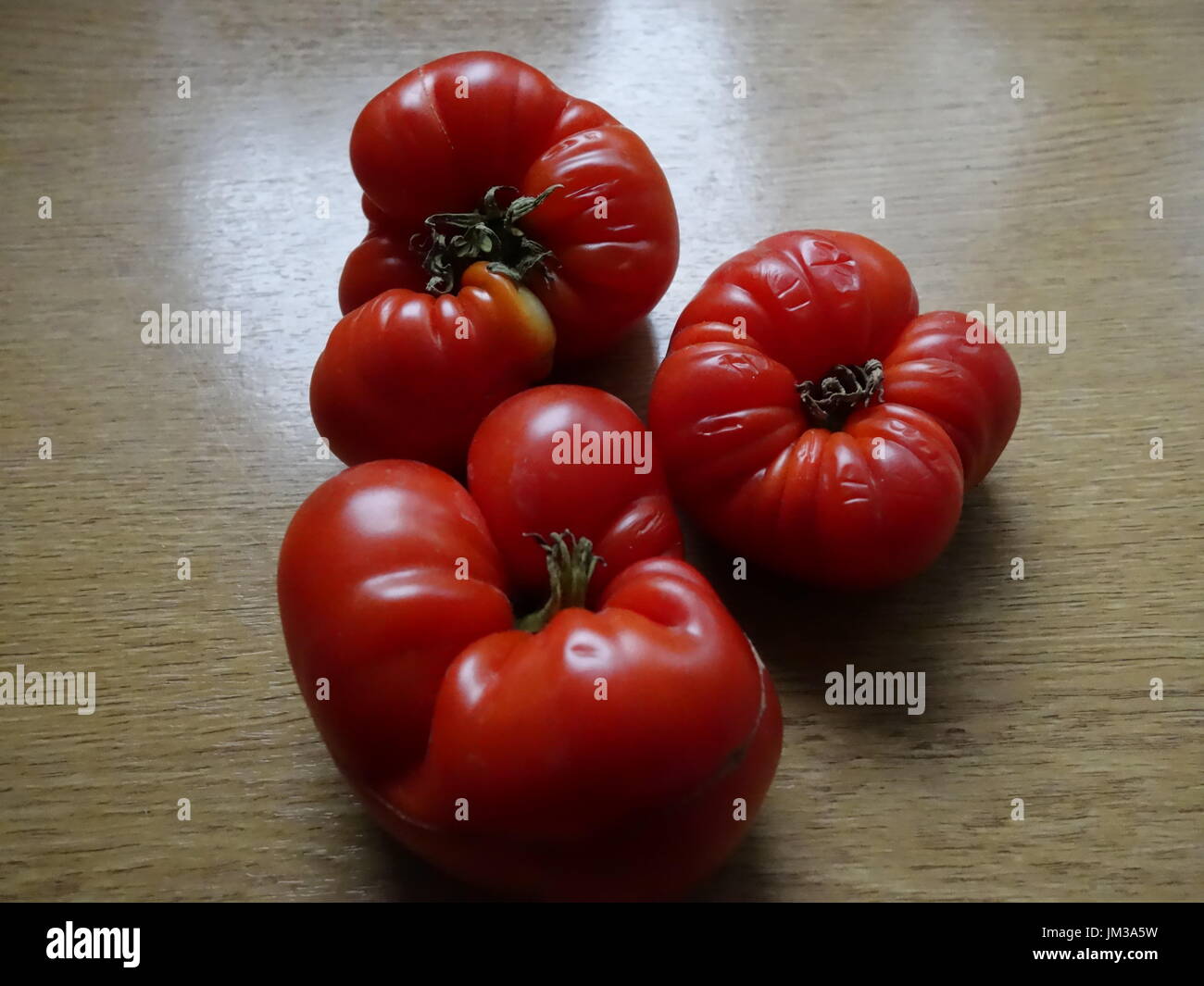 Deformed red tomato hi-res stock photography and images - Alamy