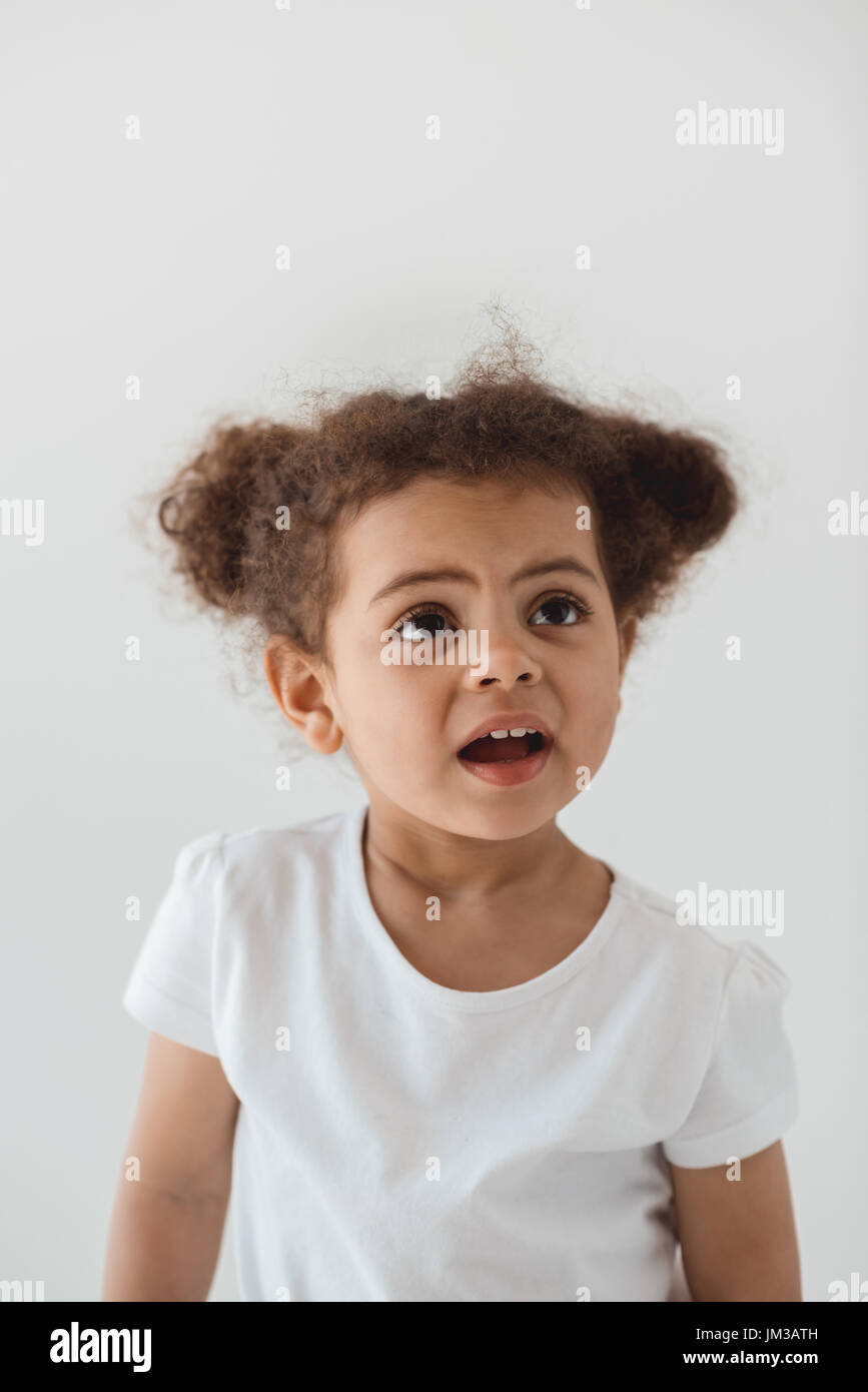 adorable little kid girl with facial expression isolated on white Stock ...