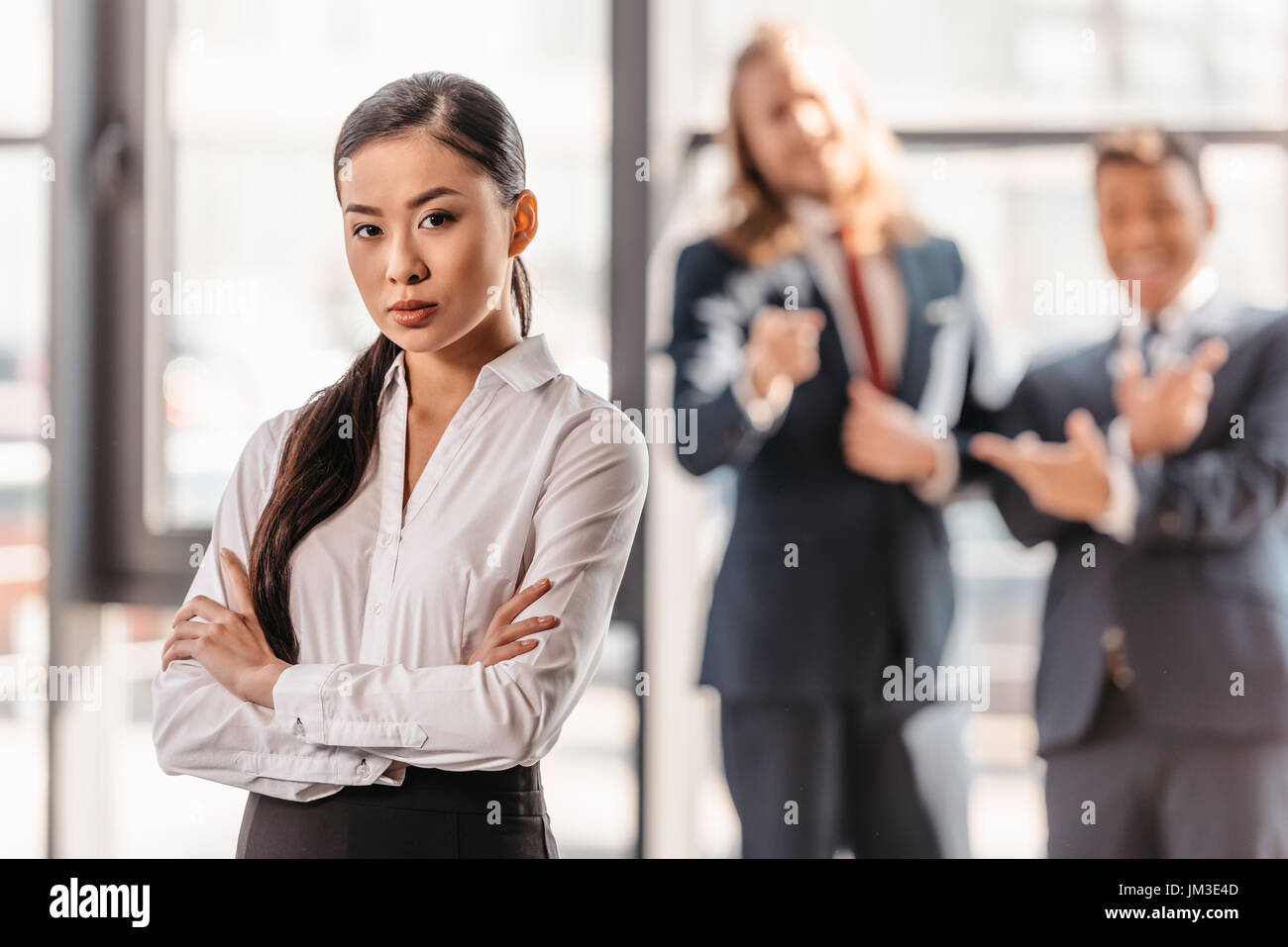Arms crossed behind back hi-res stock photography and images - Alamy