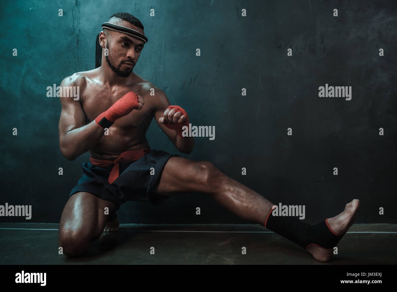 Muay Thai athlete training at Thai boxing indoors, ultimate fight ...