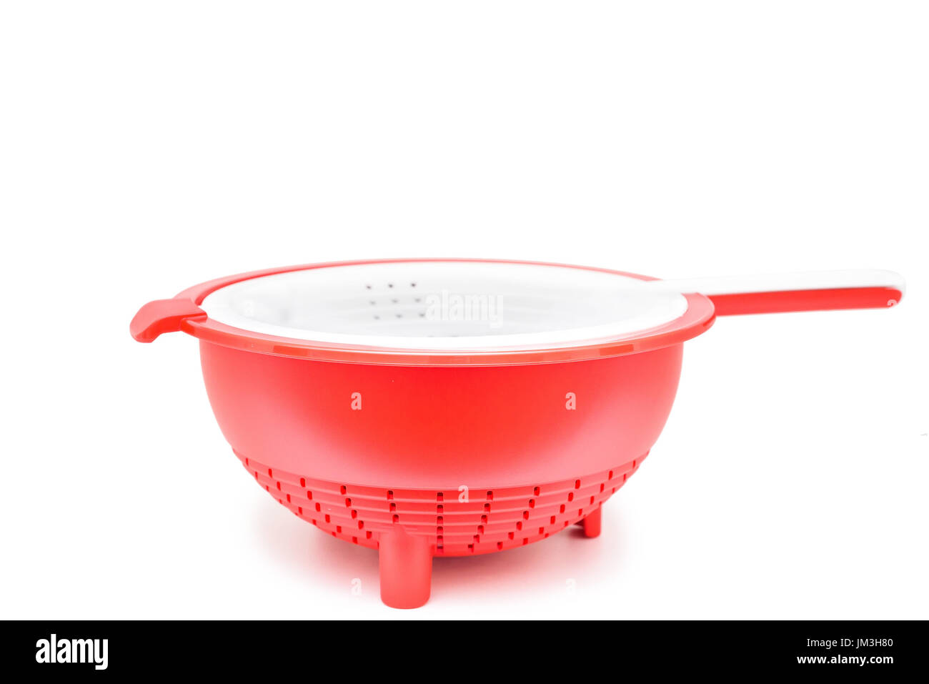 Close up modern red and white plastic colander isolated Stock Photo - Alamy