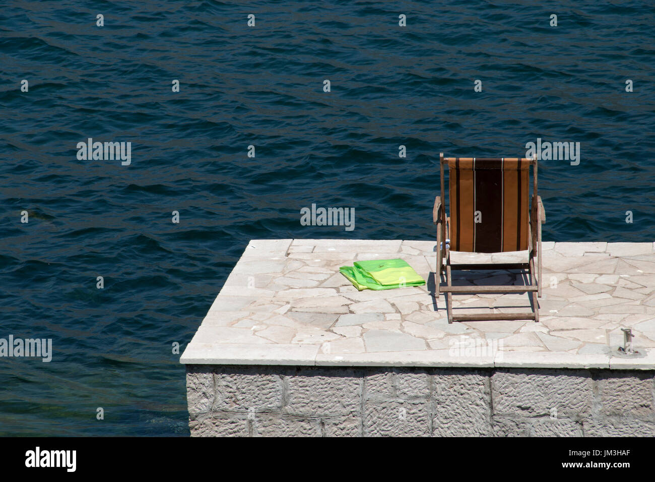 Deck Chairs On The Dock Stock Photo - Alamy