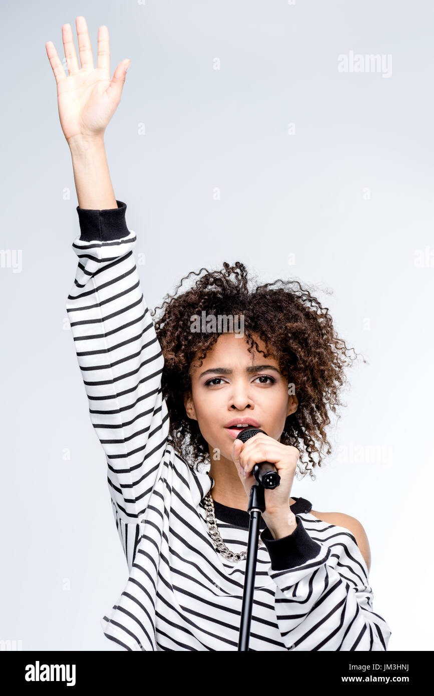 Female singer with microphone hi-res stock photography and images - Alamy