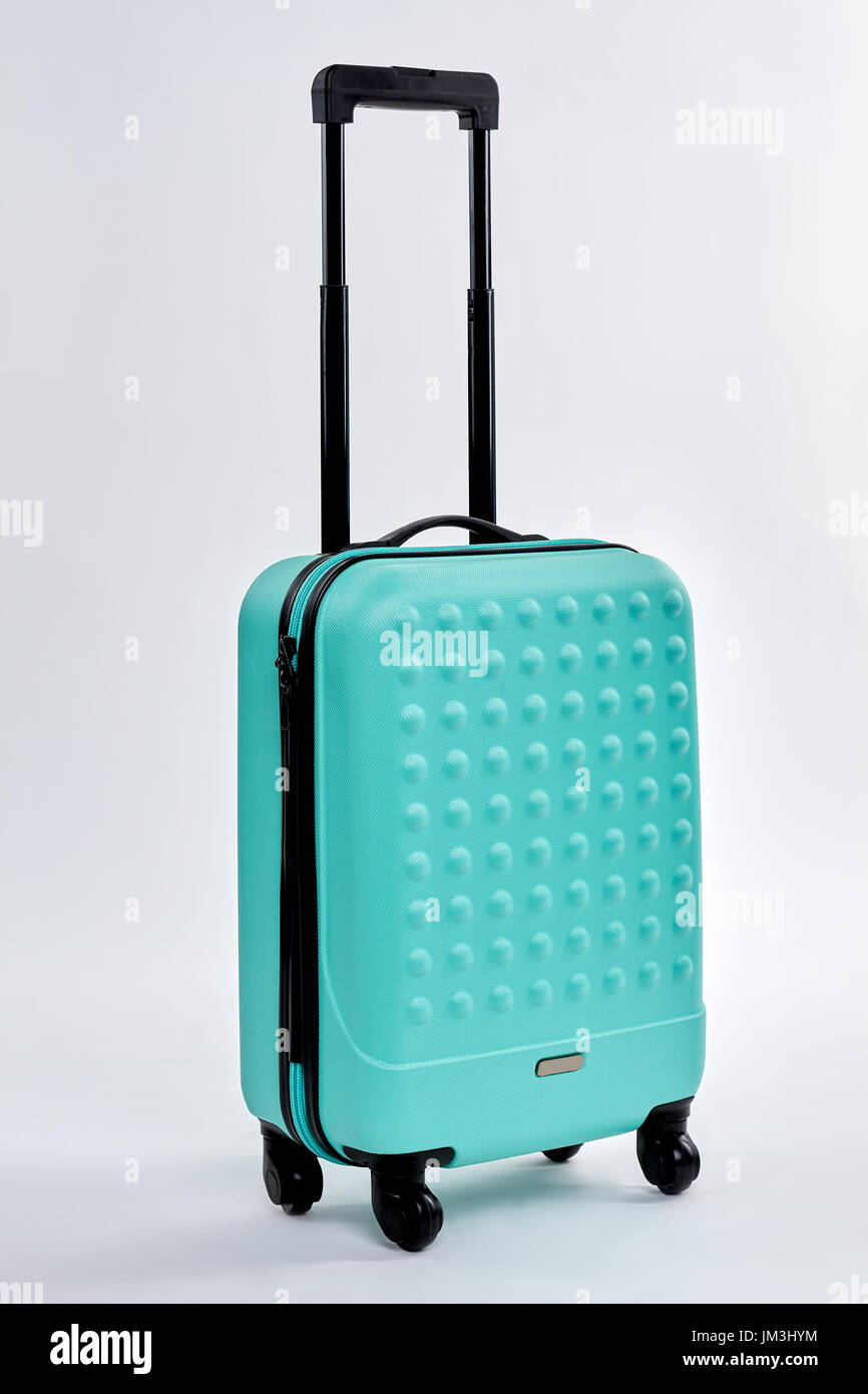 Modern large suitcase on wheels. Traveler wheeled bag, white background ...