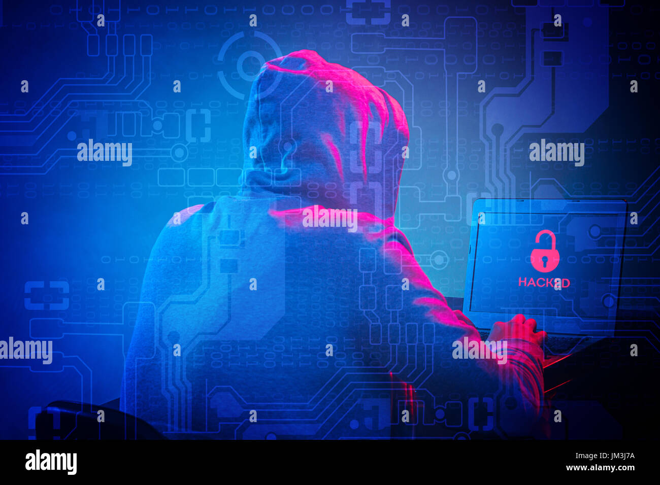 Hooded computer hacker stealing information with laptop Stock Photo - Alamy