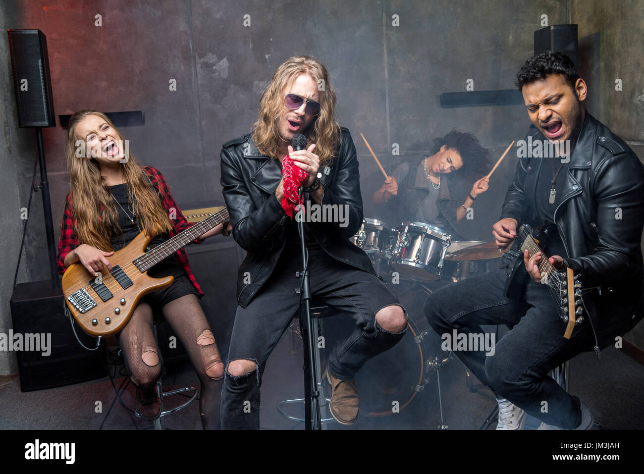 Four men in band rock hi-res stock photography and images - Alamy