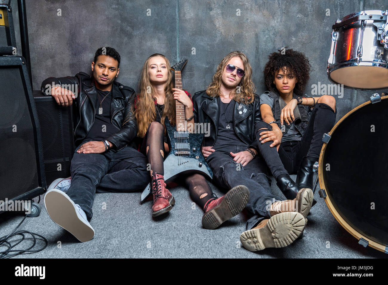 Four men in band rock hi-res stock photography and images - Alamy