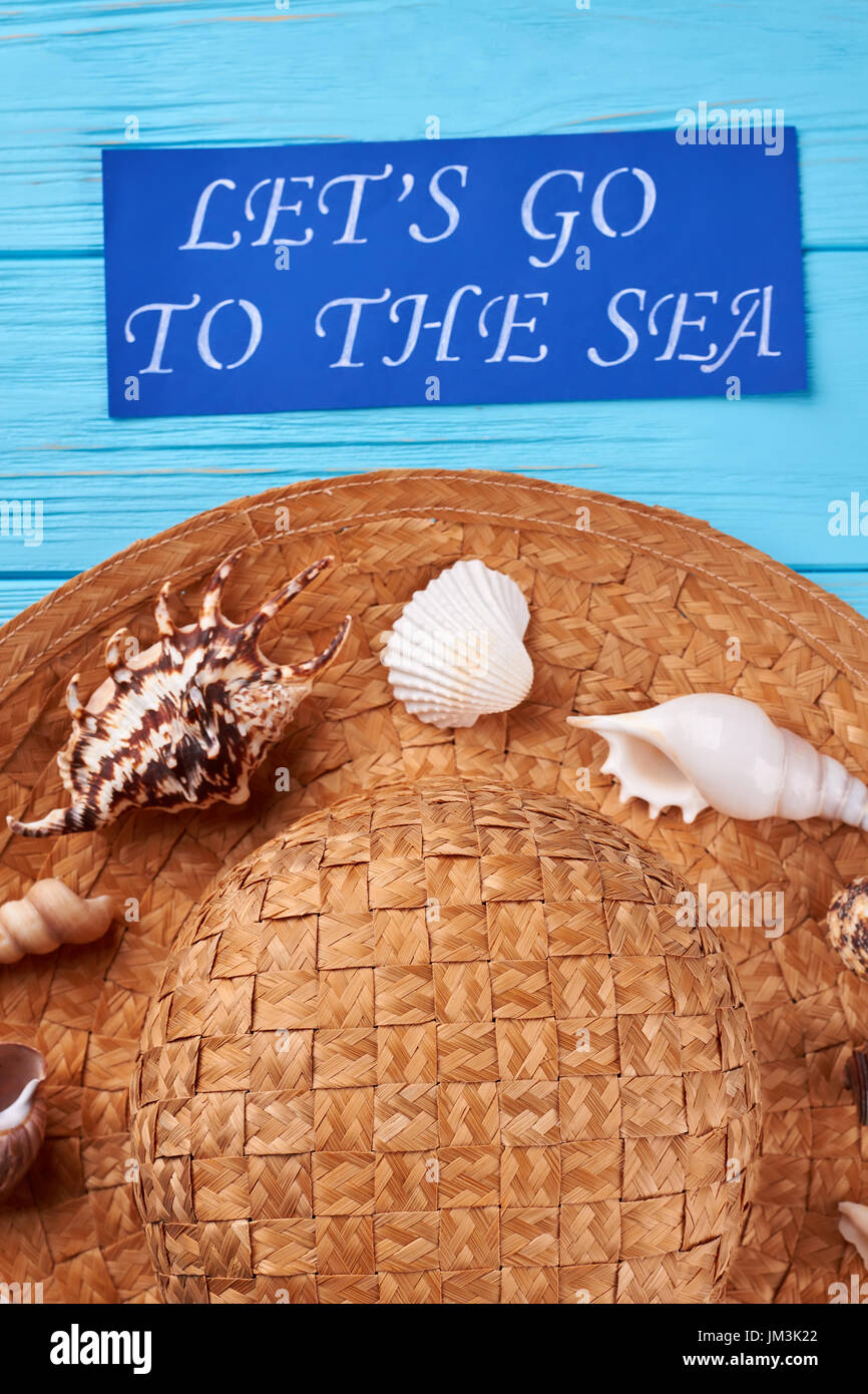 Straw hat, shells close up. Summer ocean resort background Stock Photo ...