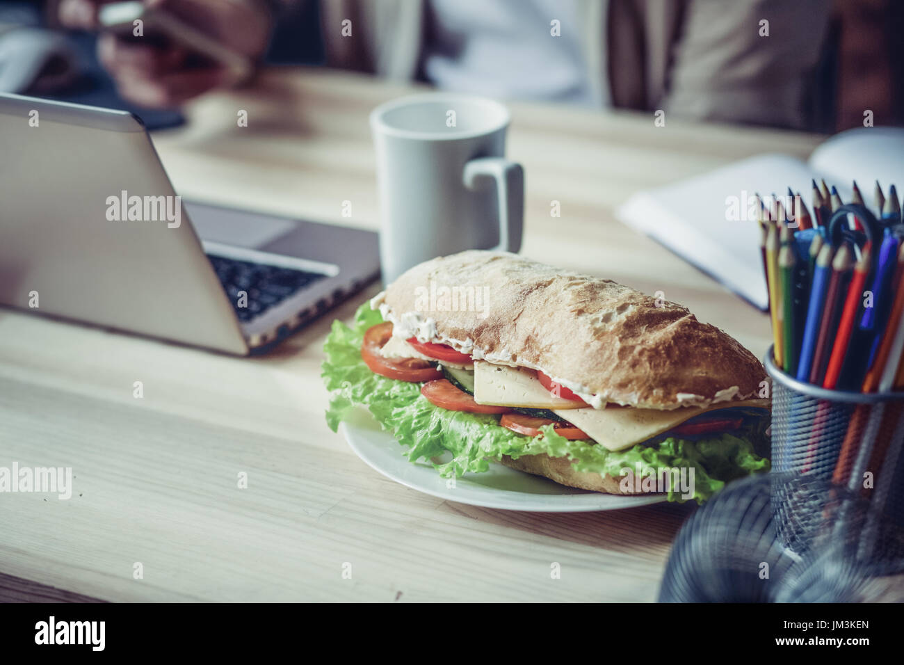 Man sandwich office desk hi-res stock photography and images - Alamy