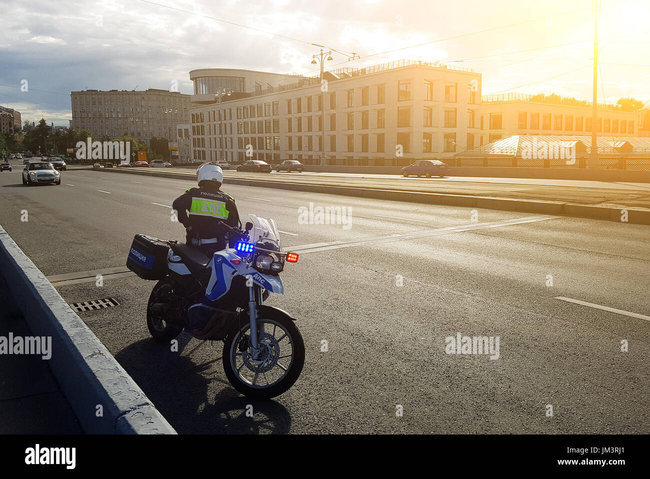 Photo of policeman with motorcycle Stock Photo - Alamy