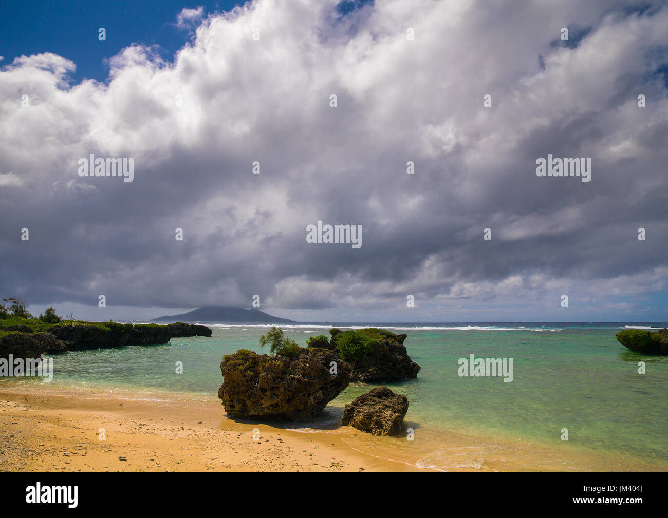 Big rocks on Eton beach with a cloudy sky, Shefa Province, Efate island ...