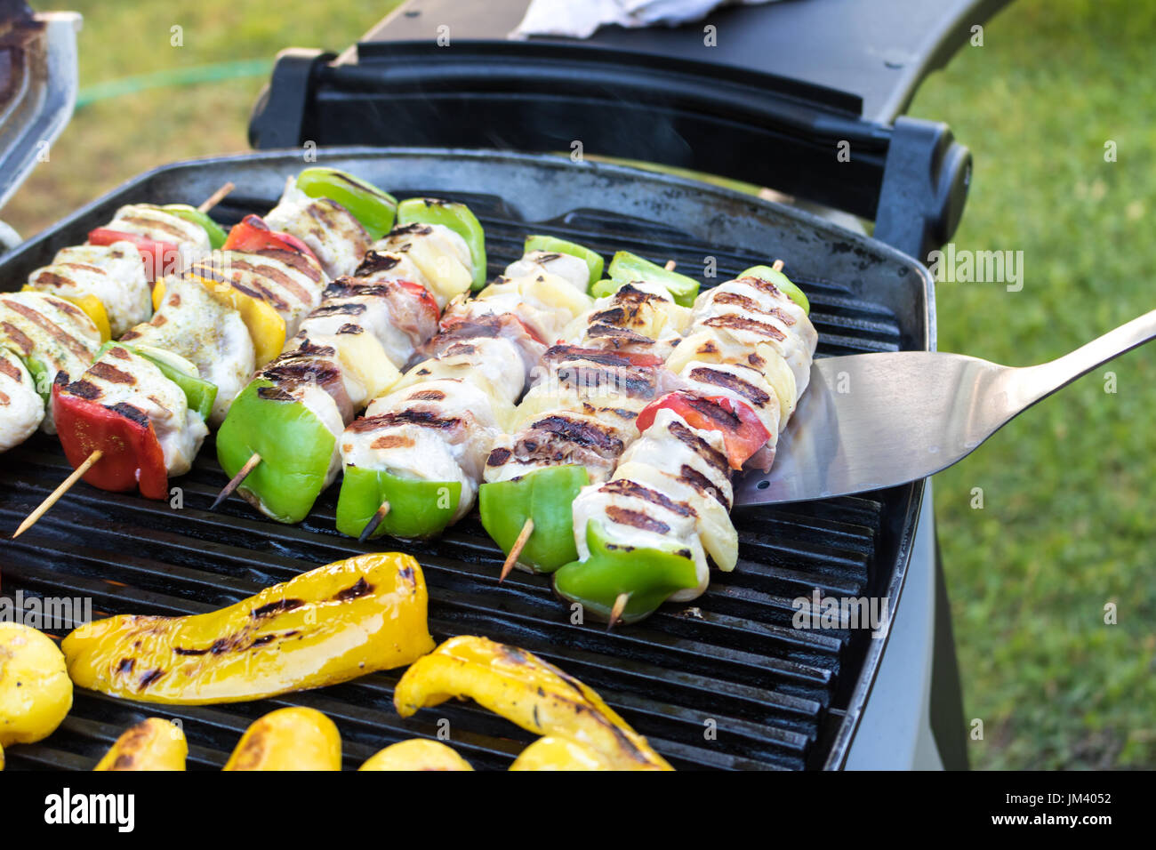 Barbecue grill with various kinds of meat, close-up. BBQ in Summer ...