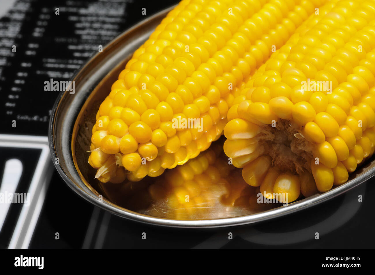 Steamed Organic Corn in Plate Stock Photo - Alamy
