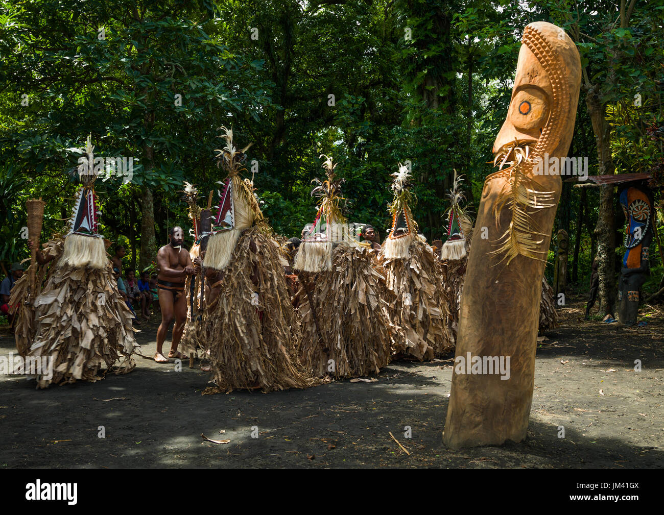 Rom dance masks and giant slit drum during a ceremony, Ambrym island ...
