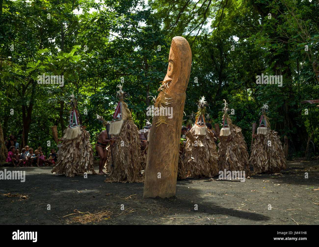 Rom dance masks and giant slit drum during a ceremony, Ambrym island ...