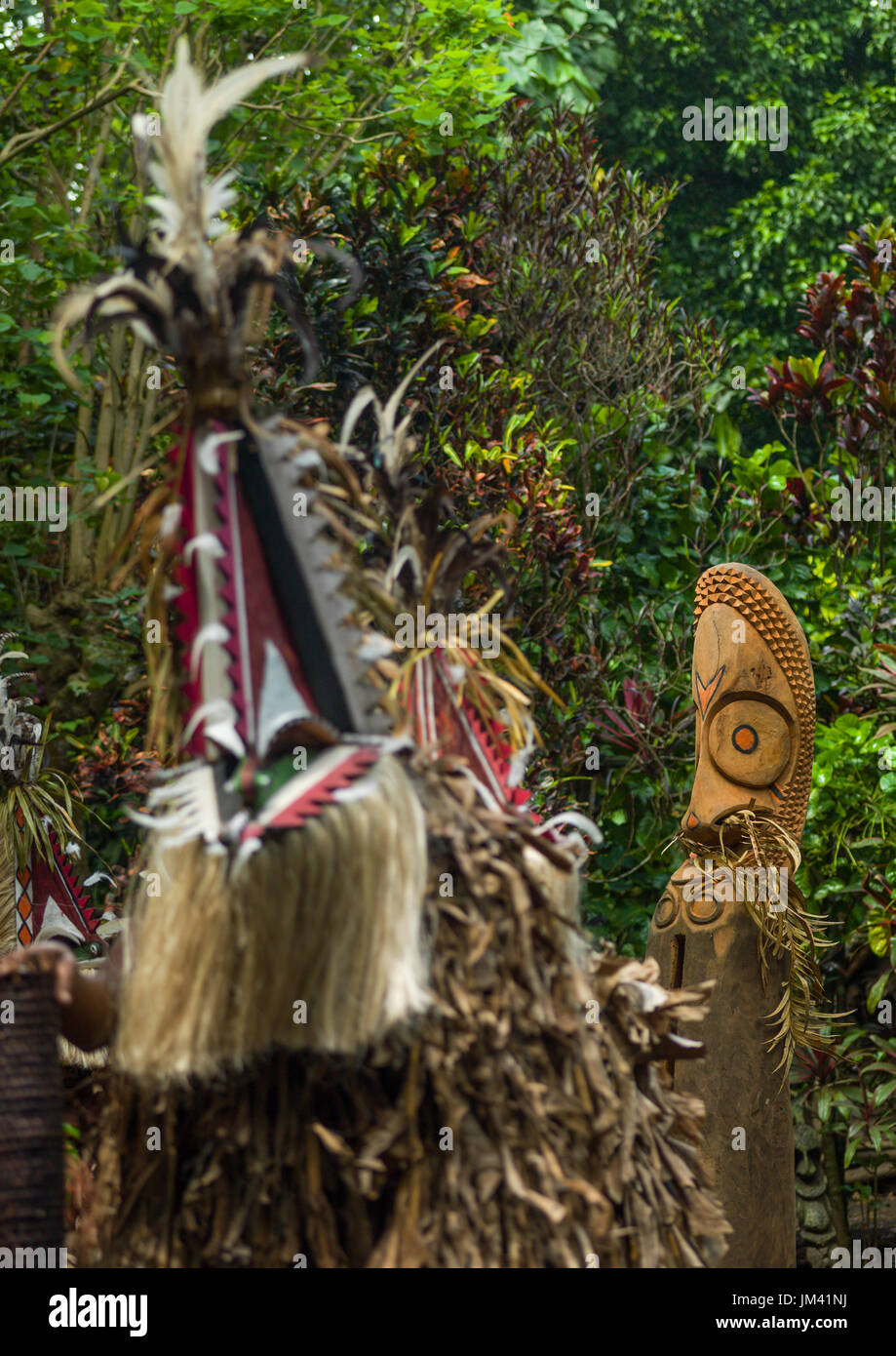 Rom dance masks and giant slit drum during a ceremony, Ambrym island ...