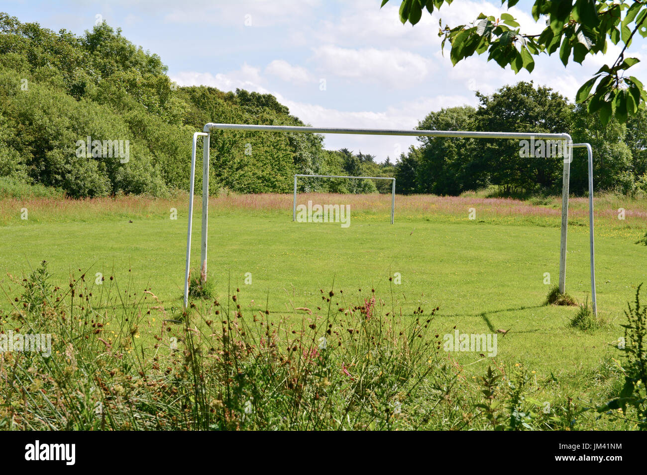 Football goal posts in park Stock Photo - Alamy